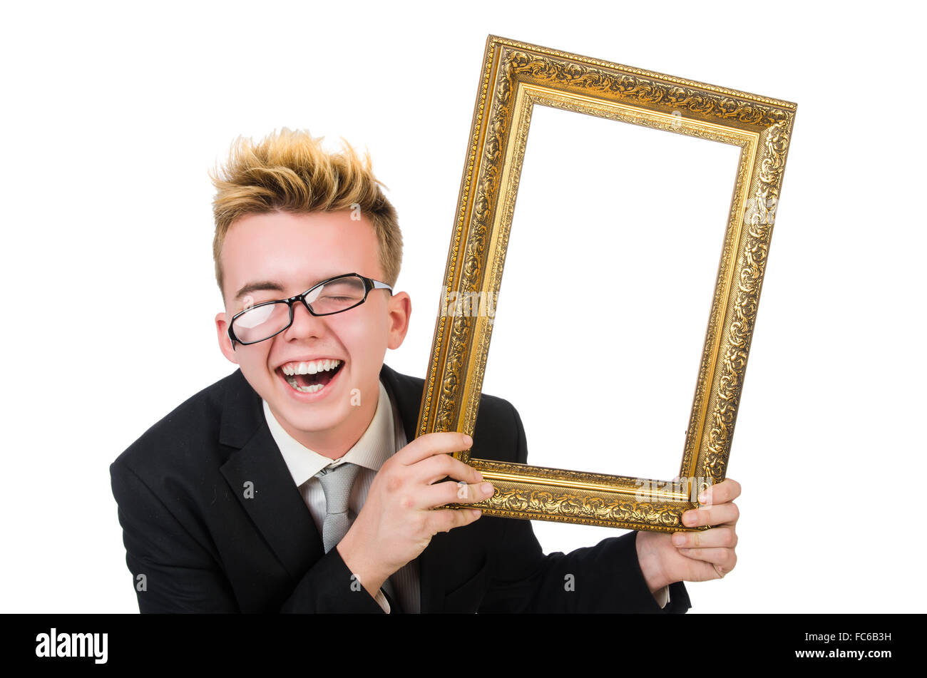 Young businessman holding picture frame isolated on white Stock Photo ...