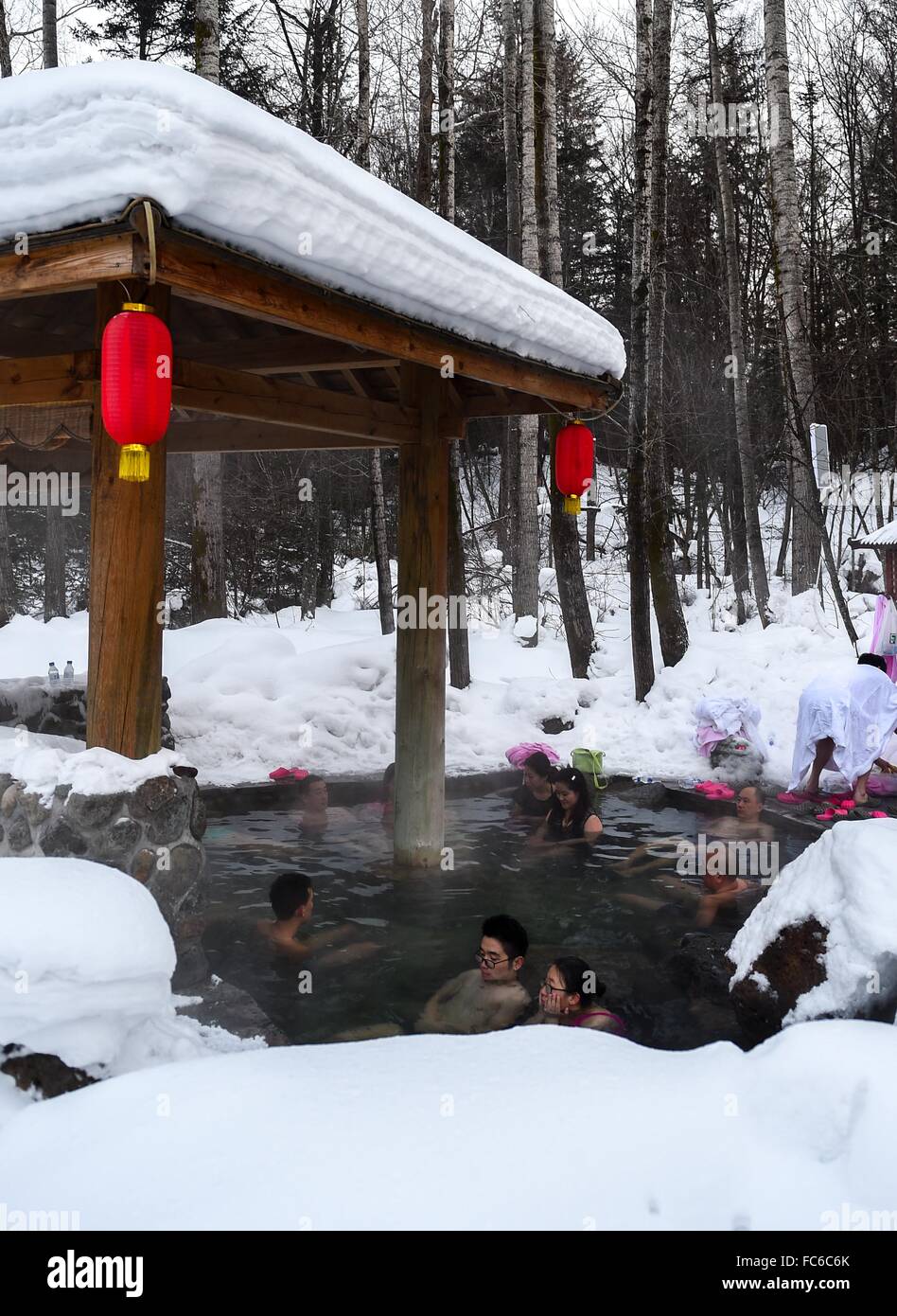 Changchun. 17th Jan, 2016. Tourists enjoy hot spring bath at Changbai ...