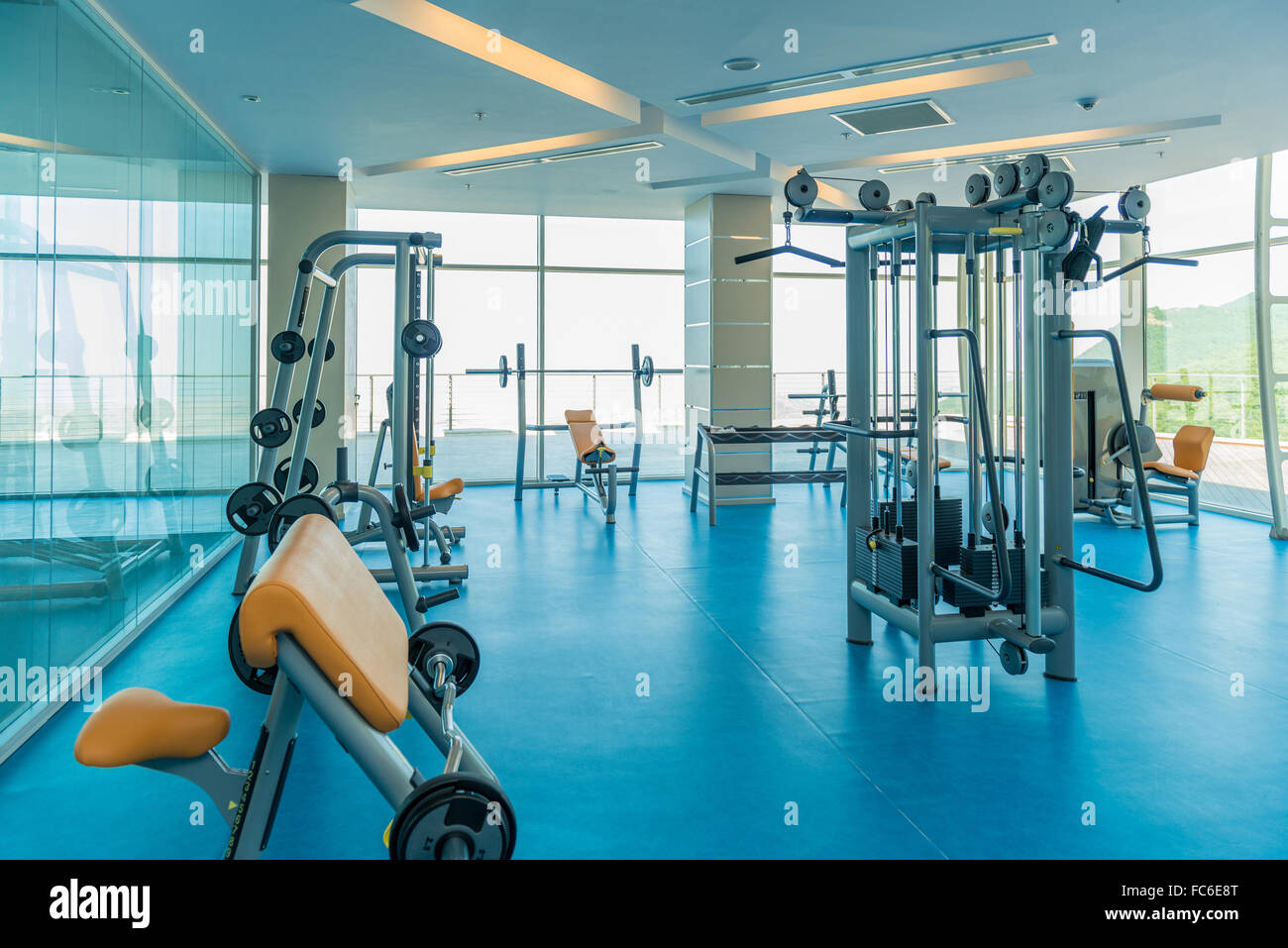 Modern gym with various sports equipment Stock Photo - Alamy