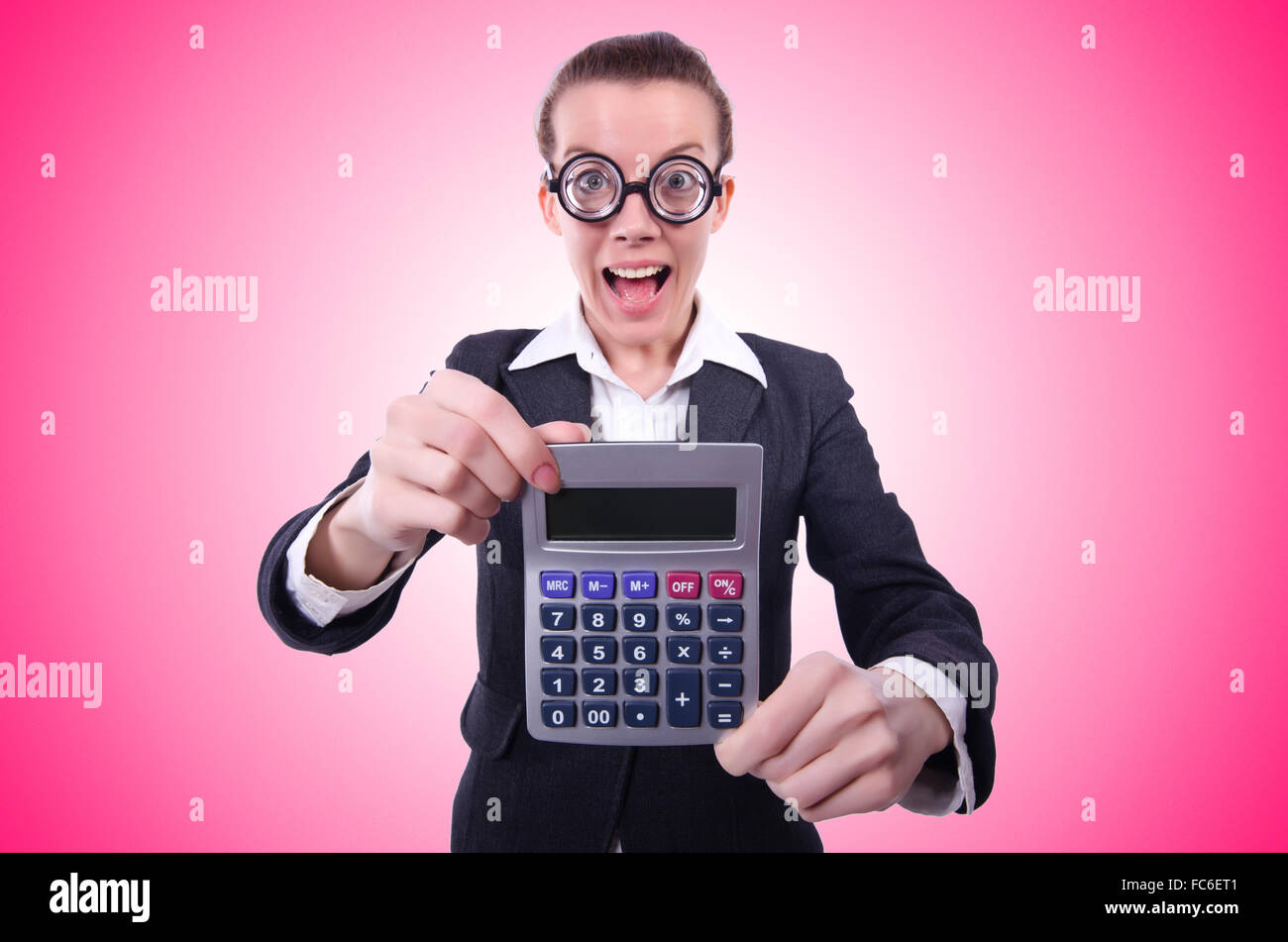 Nerd female accountant with calculator Stock Photo - Alamy