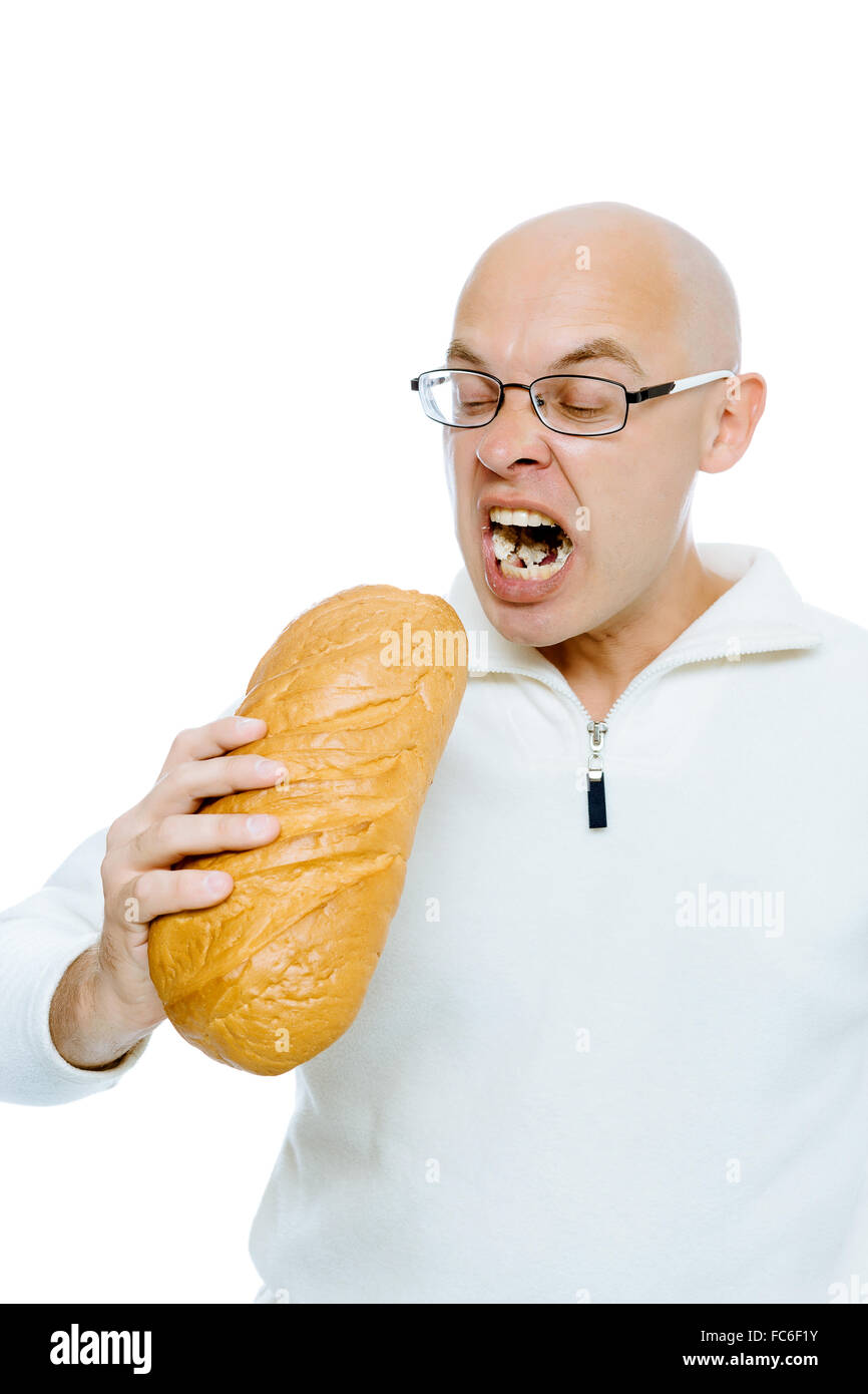 man biting a loaf. Isolated on white Stock Photo - Alamy