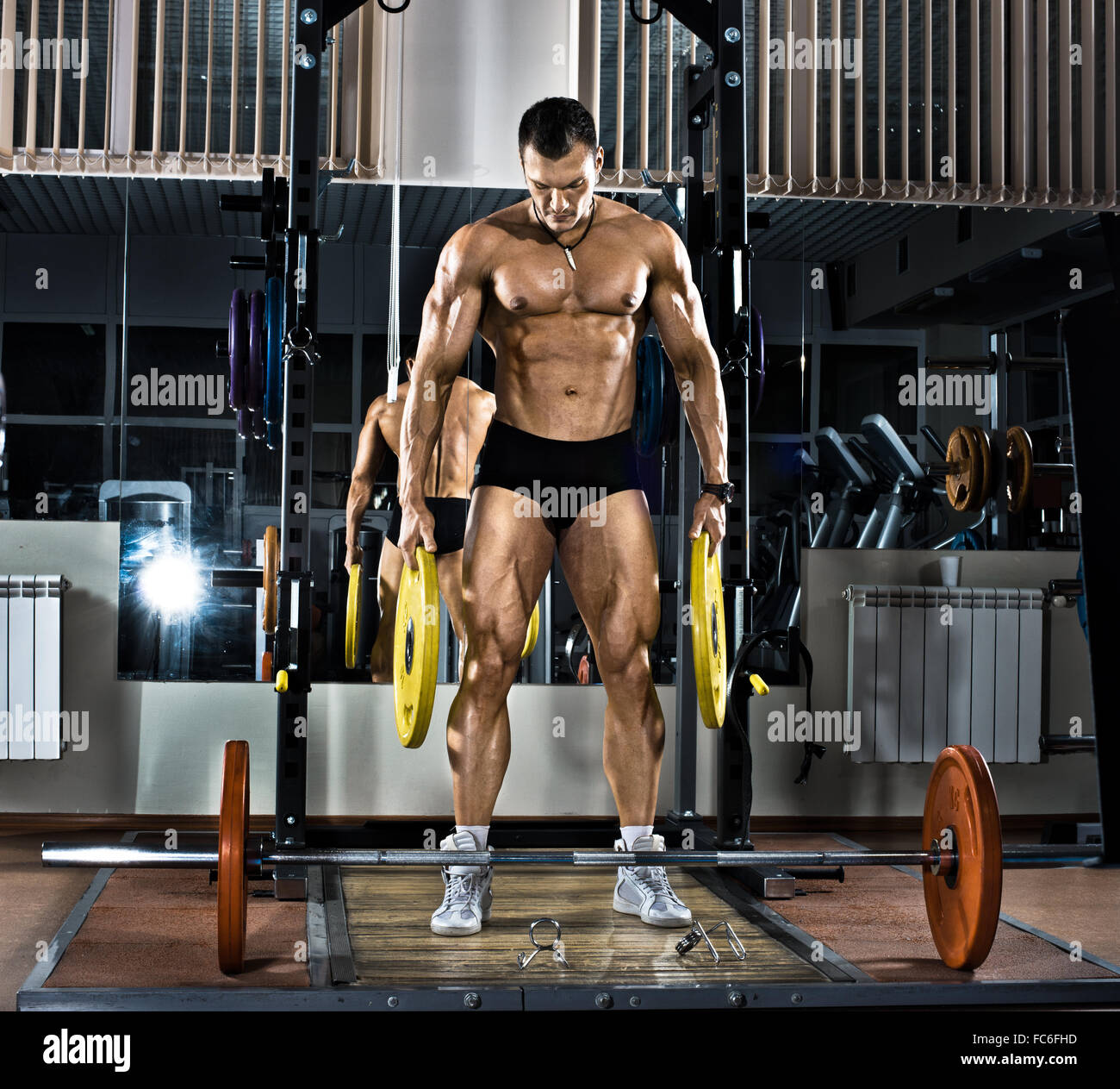 Power athletic guy bodybuilder execute hi-res stock photography and ...