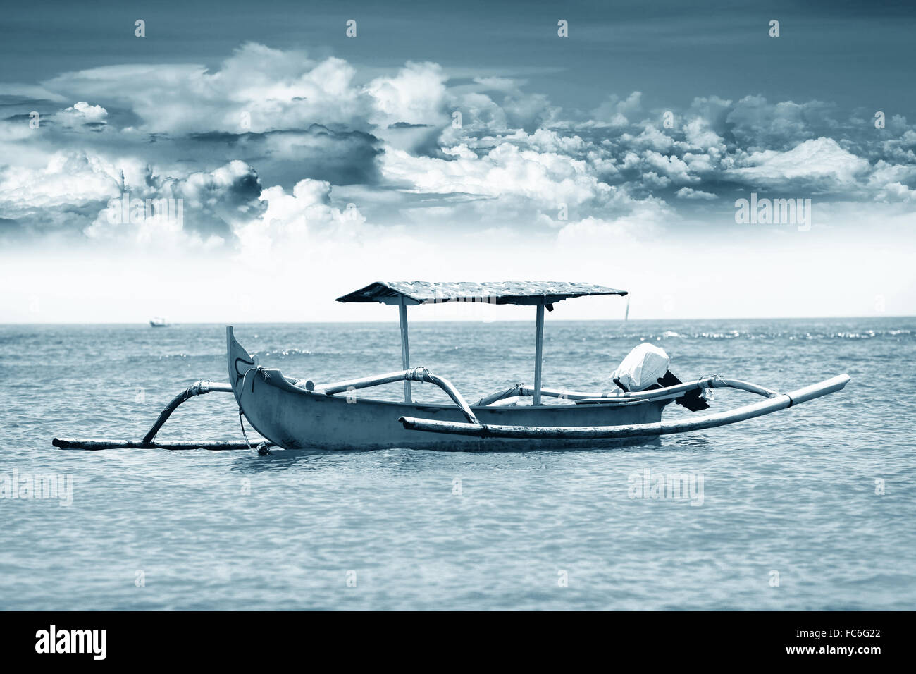 Lonely boat at ocean Stock Photo - Alamy