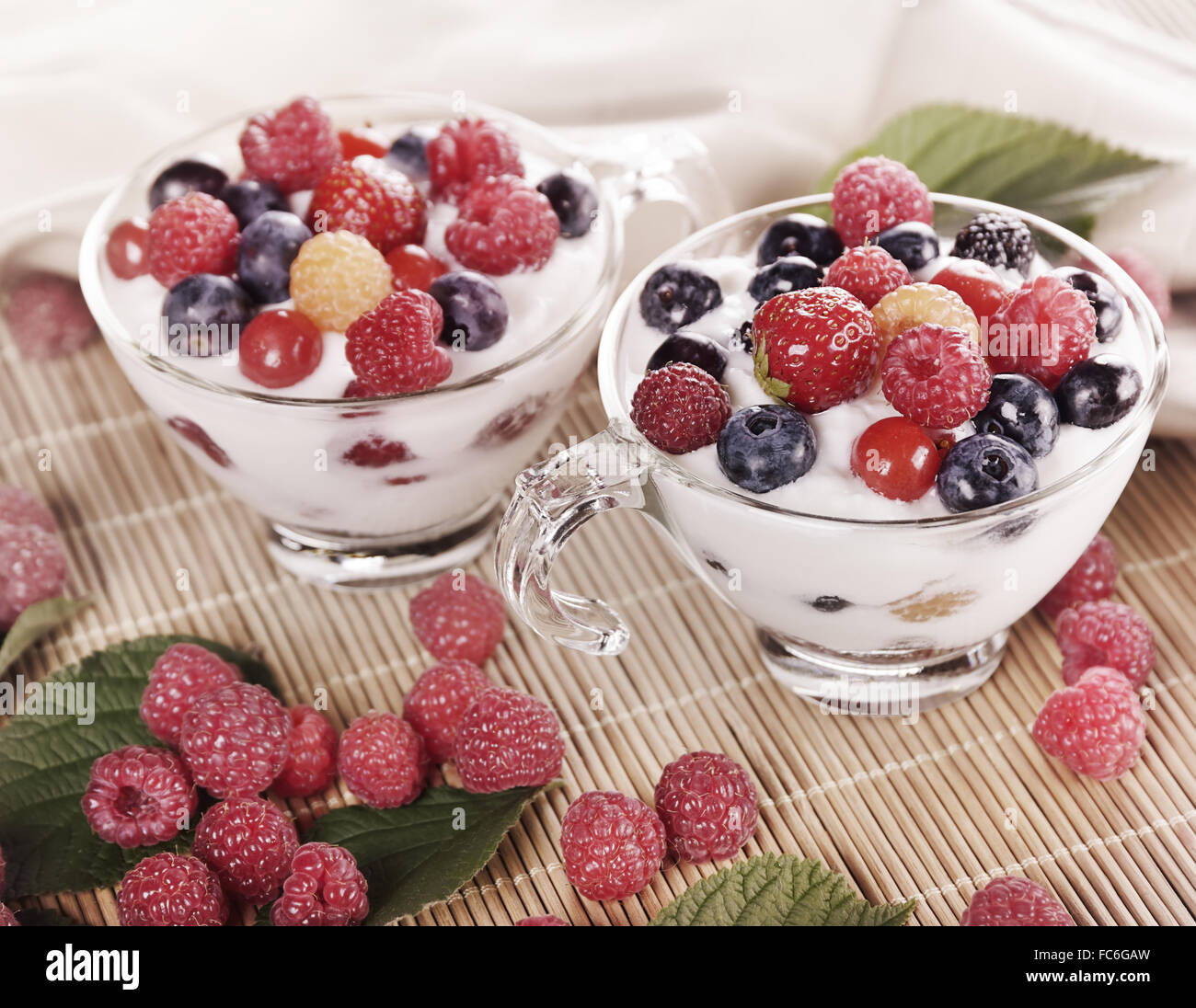 Cups Of Yogurt With Berries Stock Photo - Alamy