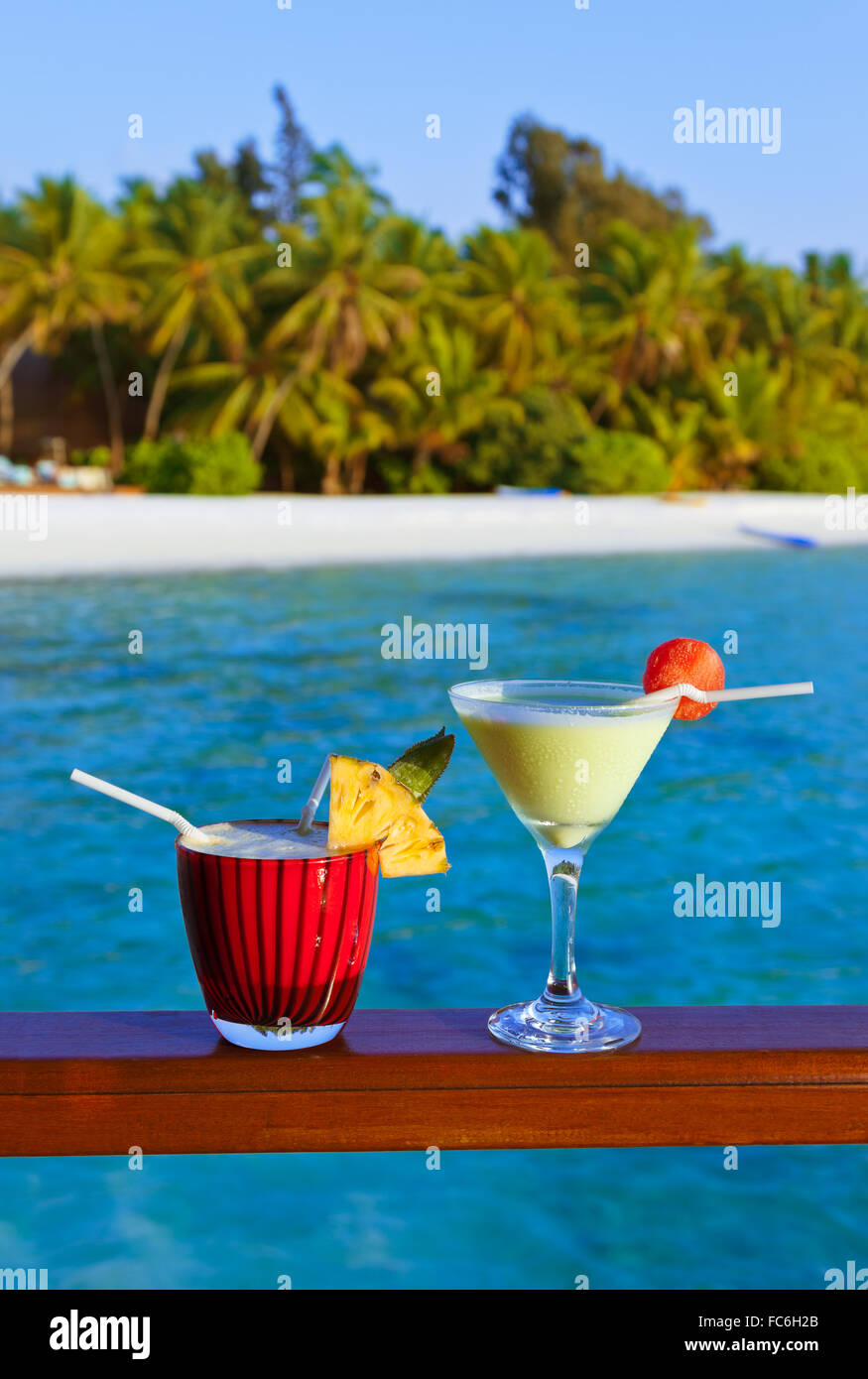 Fruit cocktail on Maldives beach Stock Photo - Alamy