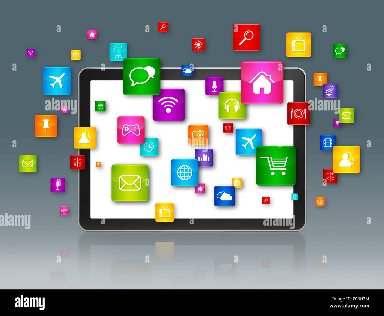 Digital Tablet and flying apps icons Stock Photo - Alamy