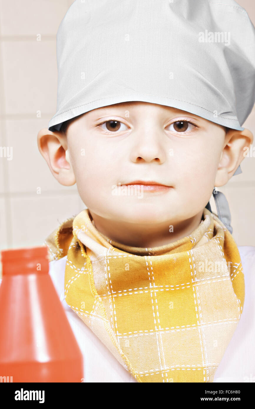 Portrait of little cook Stock Photo - Alamy