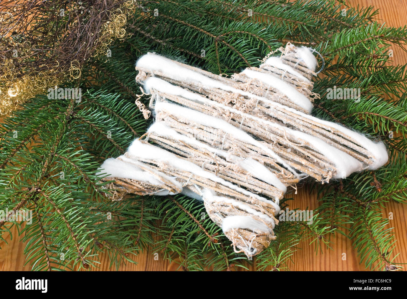 Big star on fir branch Stock Photo - Alamy