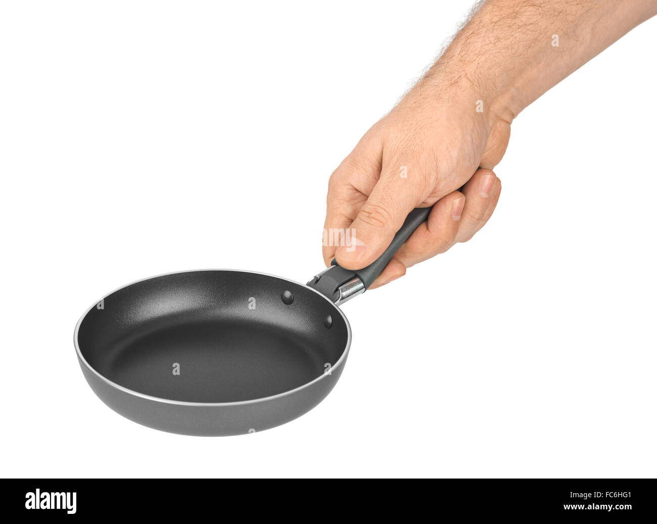 Hand with frying pan hi-res stock photography and images - Alamy