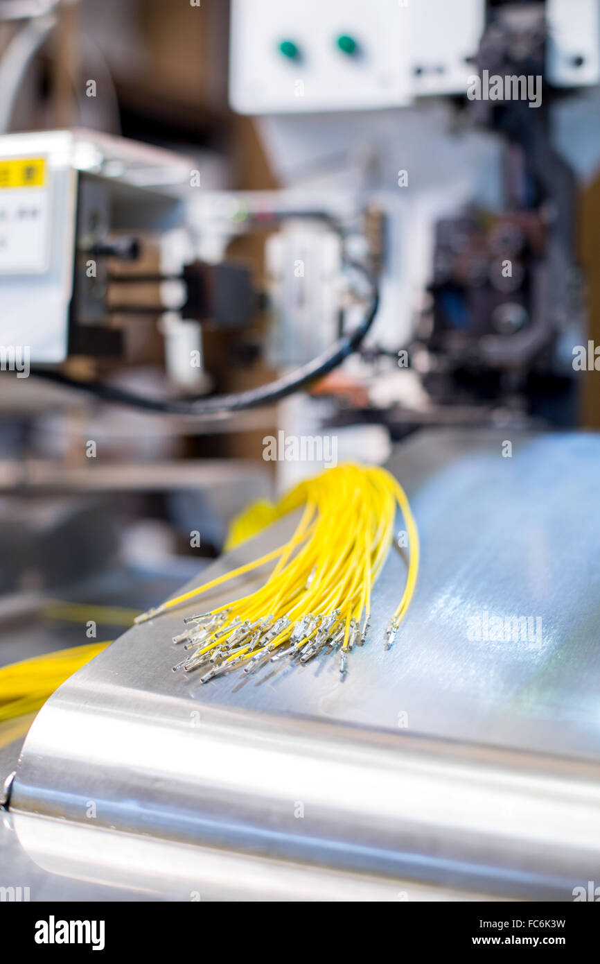 Image of crimped wires on machine Stock Photo - Alamy