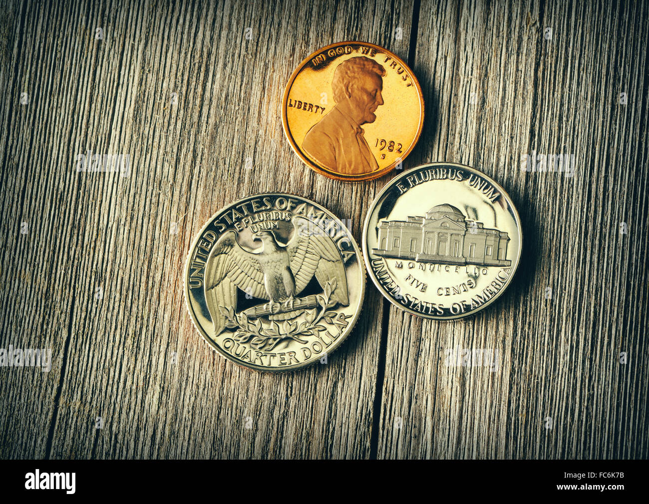US cent coins over wooden background Stock Photo - Alamy