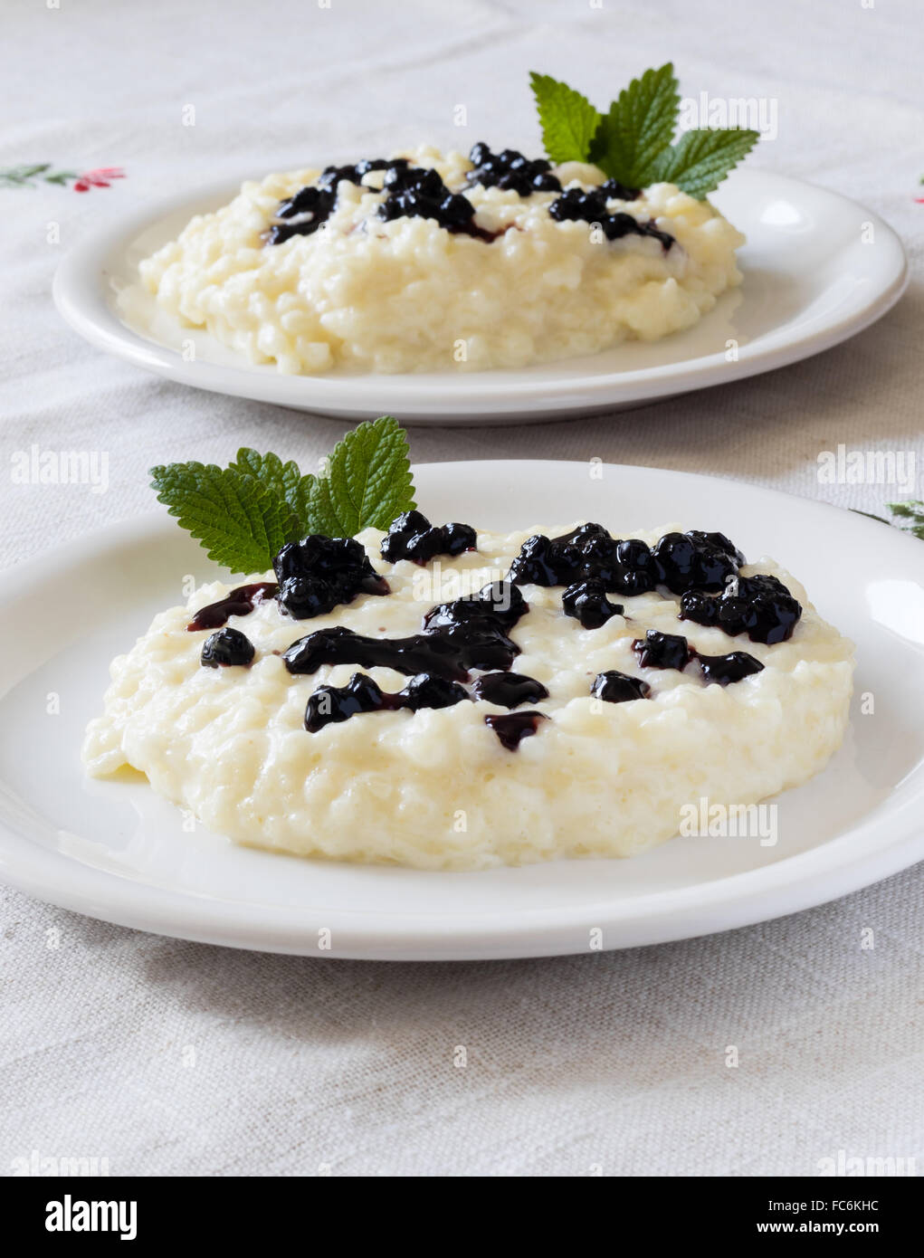 rice pudding with blueberry cream Stock Photo - Alamy