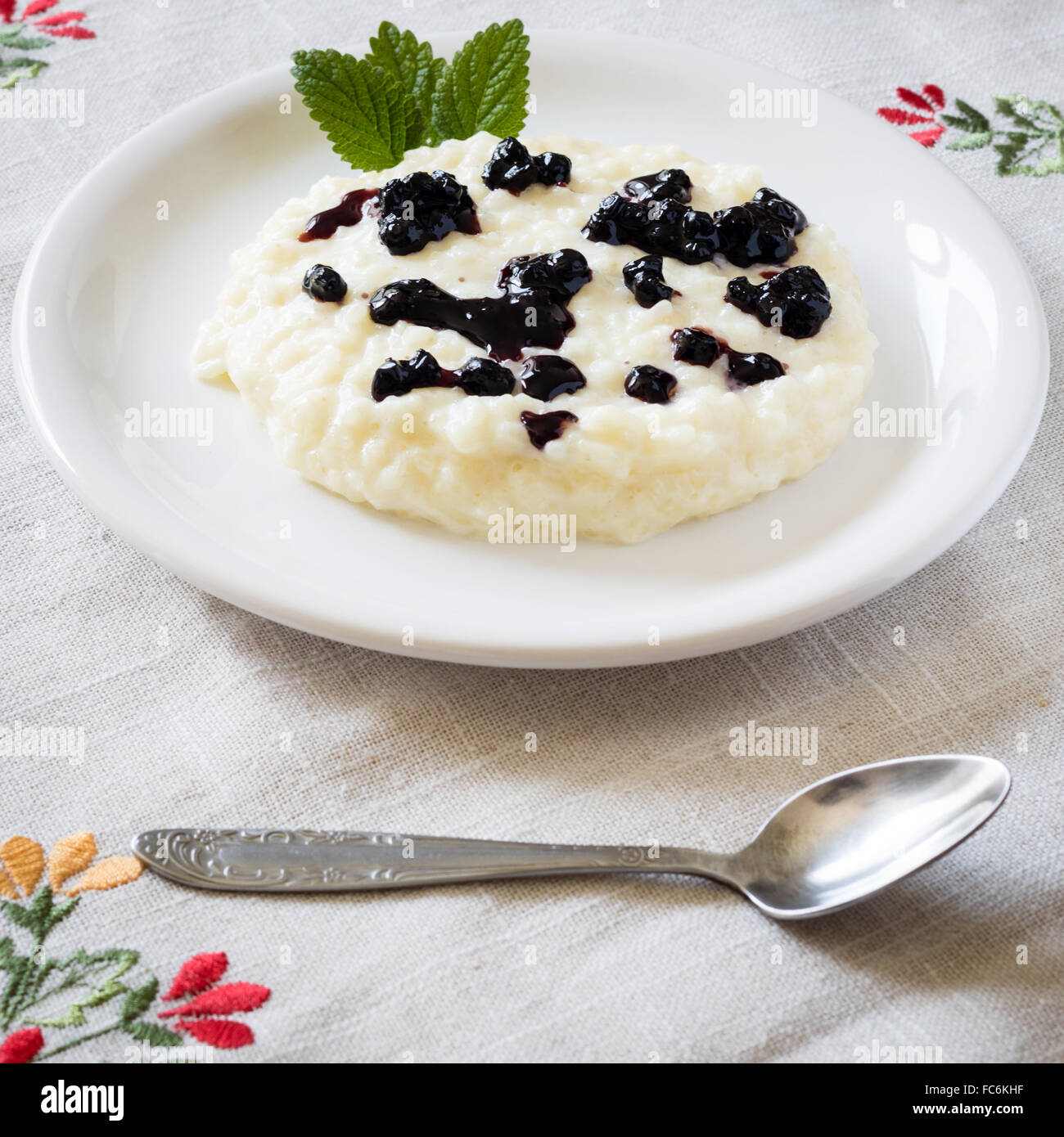 rice pudding with blueberry cream Stock Photo - Alamy