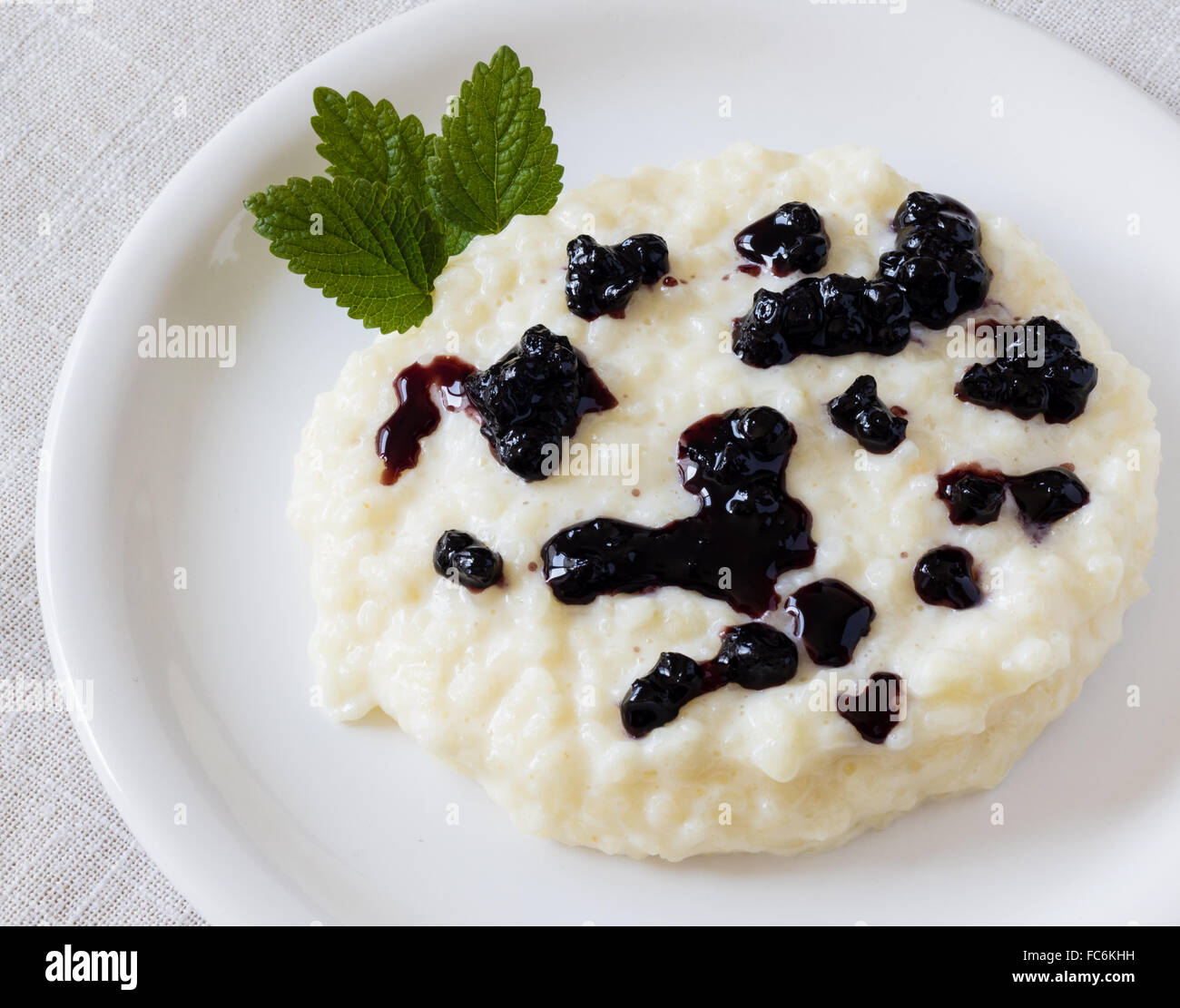 rice pudding with blueberry cream Stock Photo - Alamy