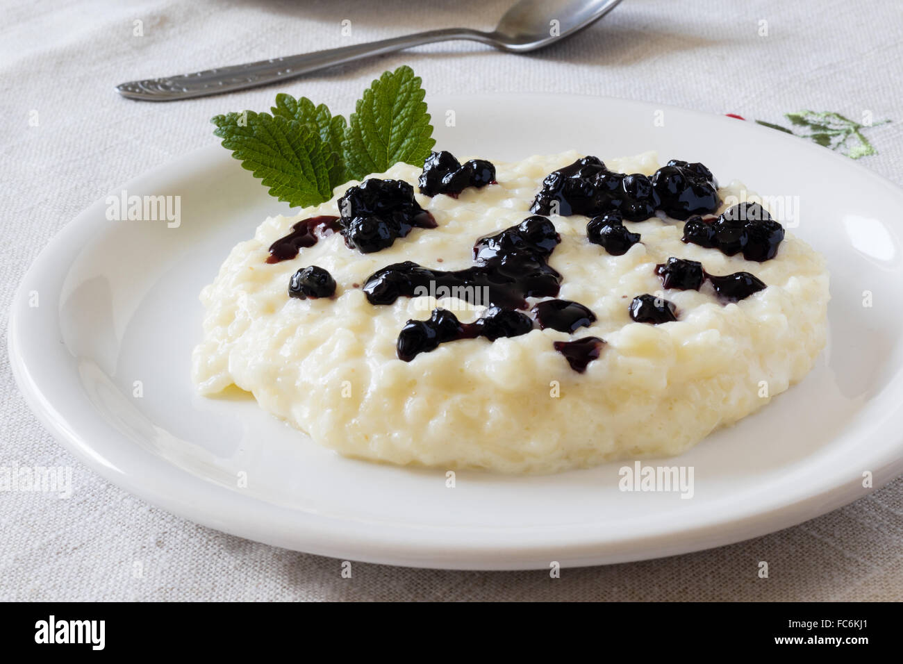 rice pudding with blueberry cream Stock Photo - Alamy