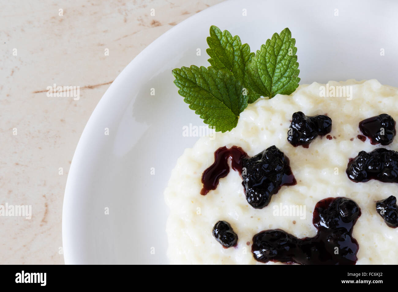 rice pudding with blueberry cream Stock Photo - Alamy