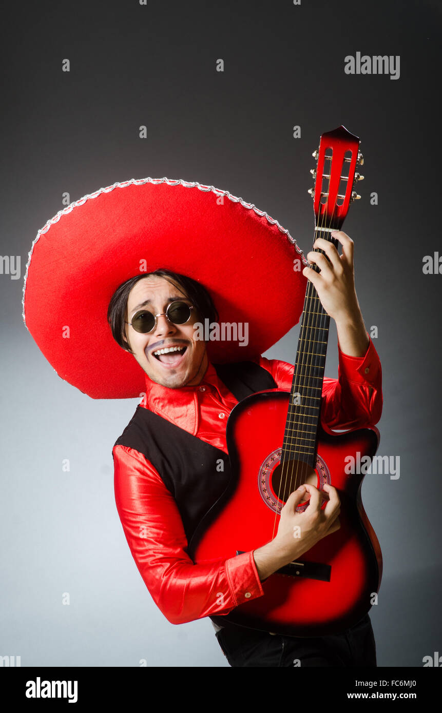 Mexican guitar player in red Stock Photo - Alamy