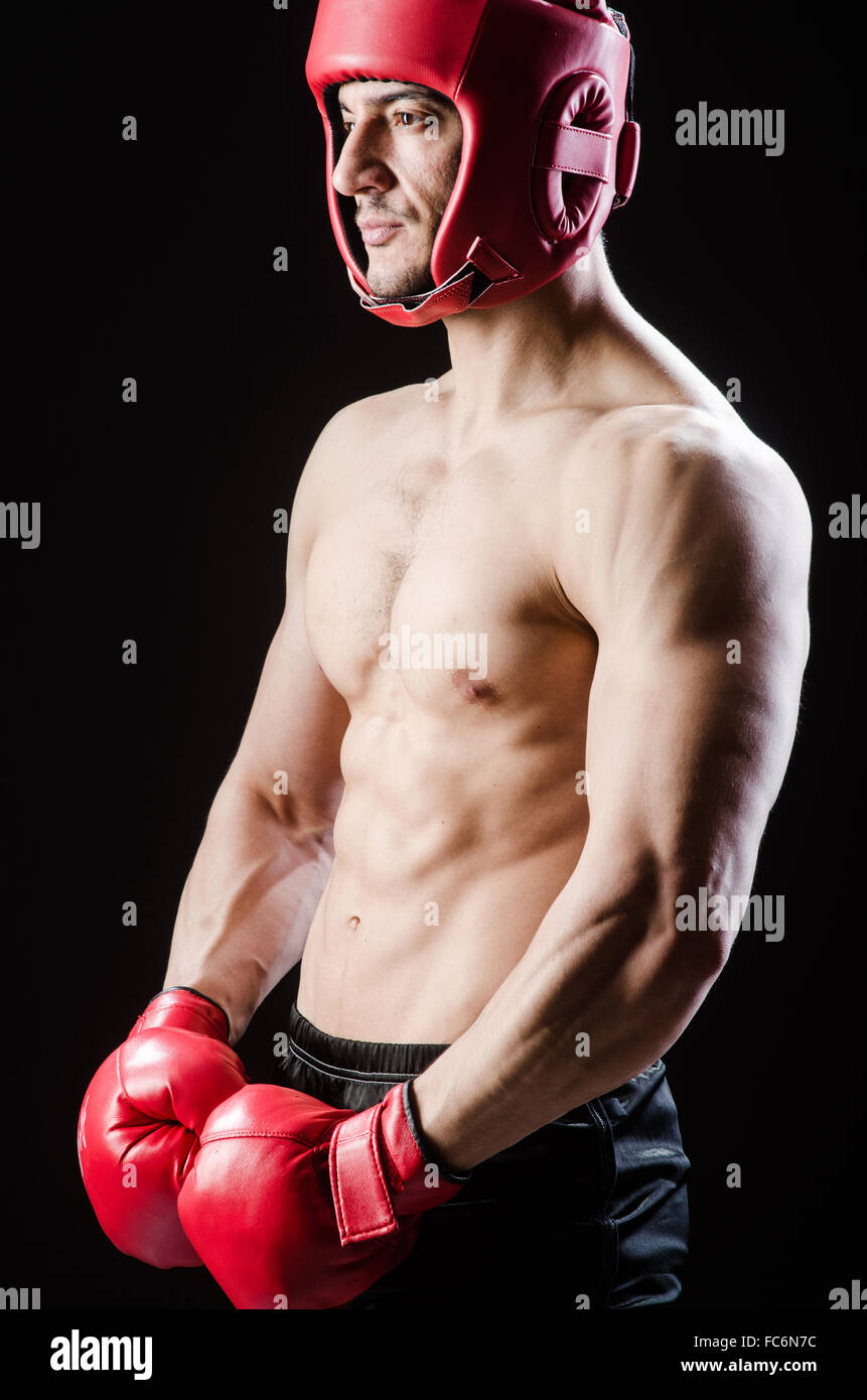 Muscular man in boxing concept Stock Photo - Alamy