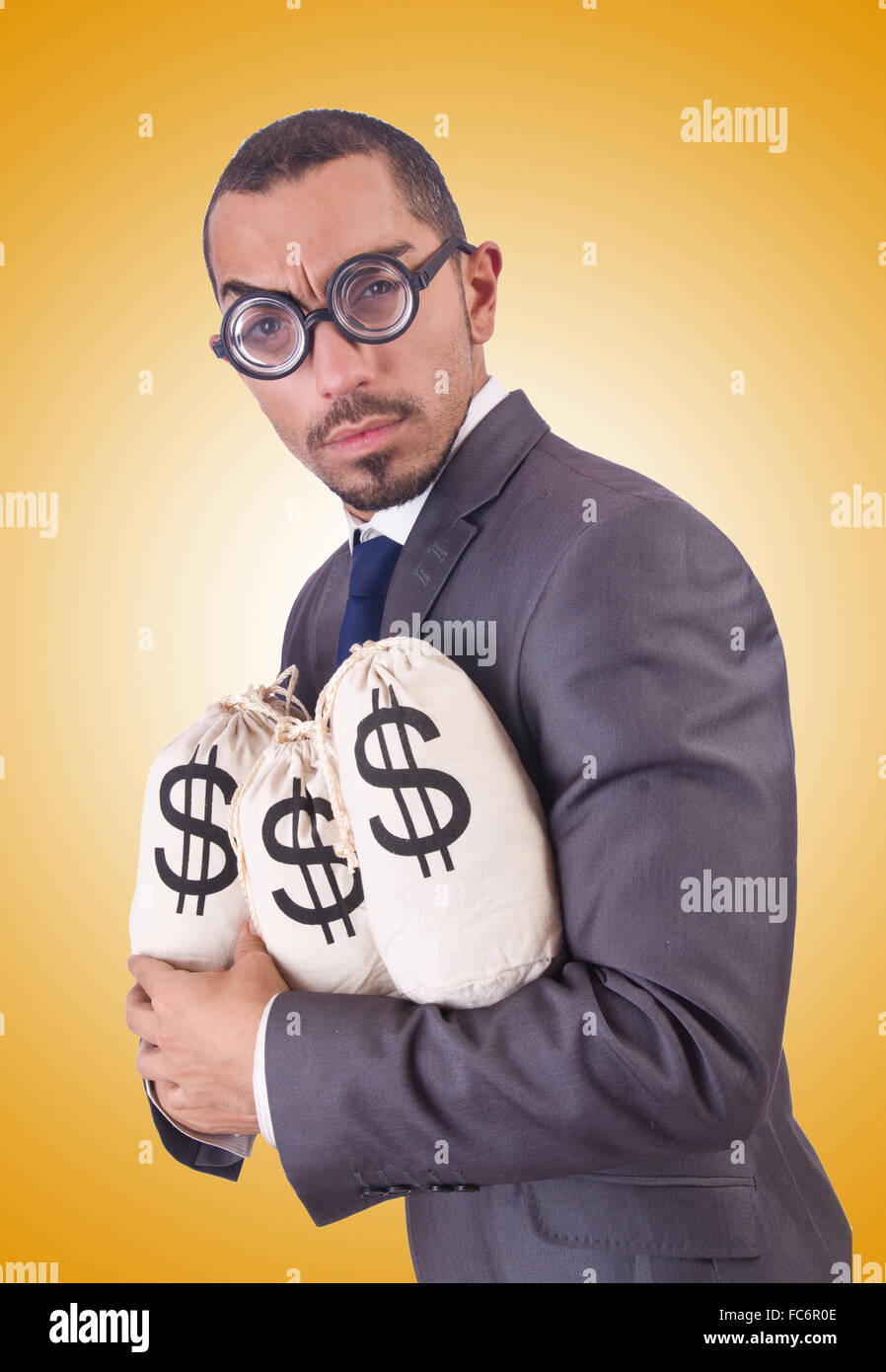 Man with money sacks on white Stock Photo - Alamy