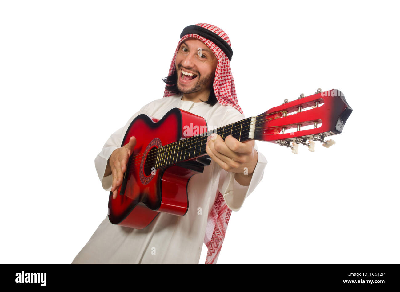 Arab man playing isolated on white Stock Photo - Alamy