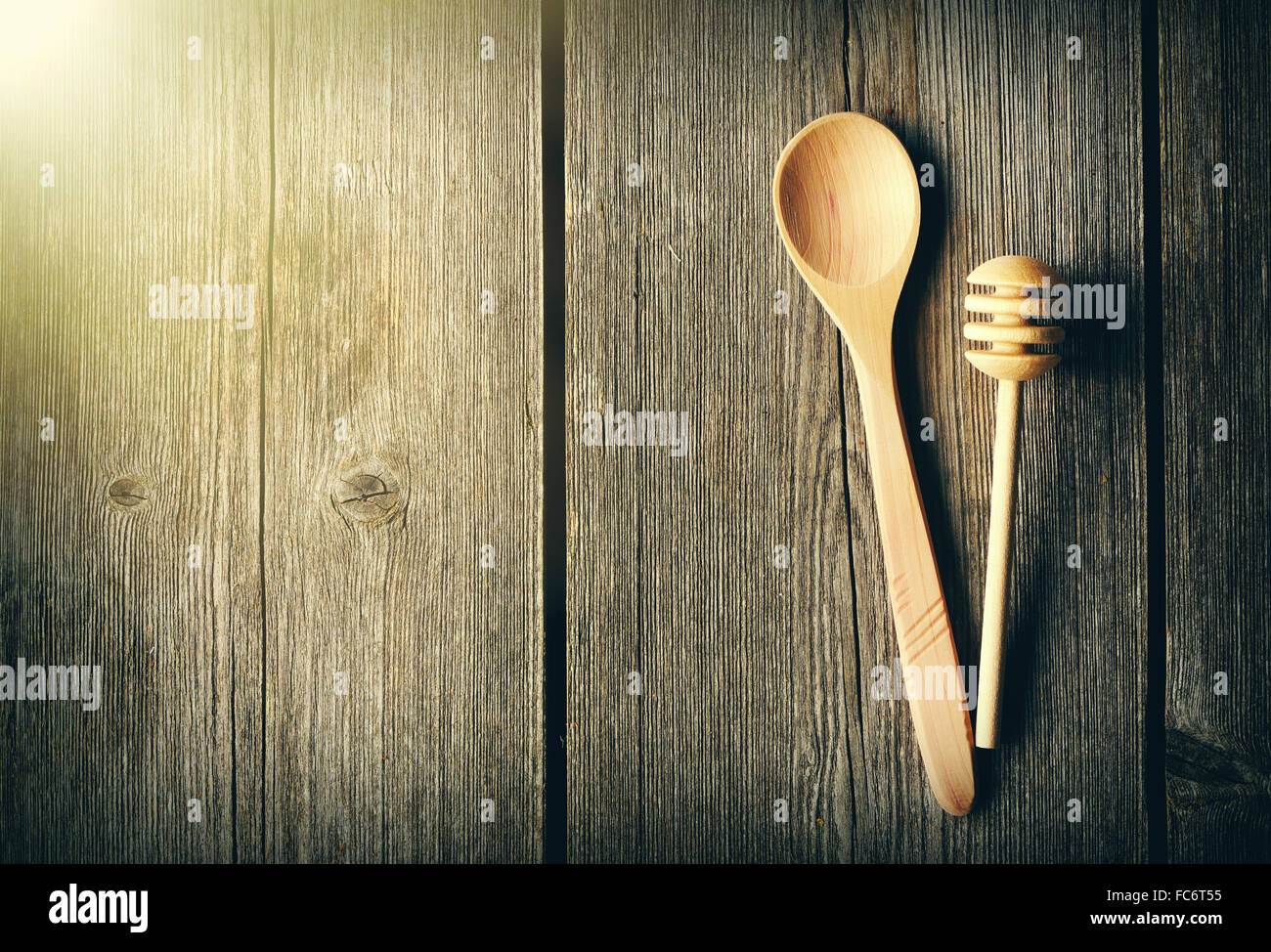 Wooden spoon and dipper Stock Photo - Alamy