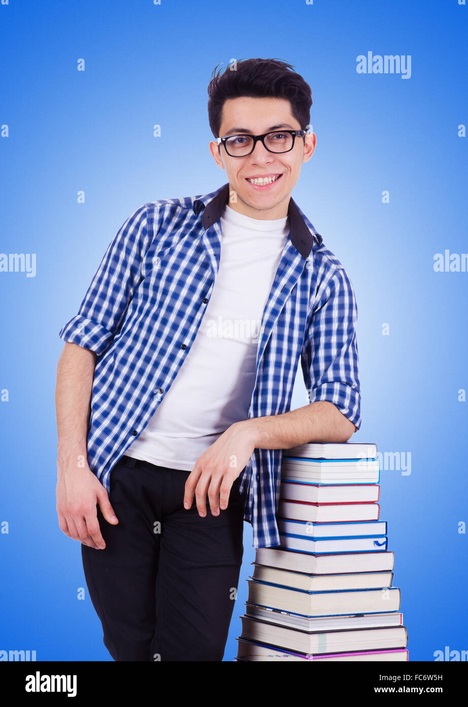 Student with lots of books on white Stock Photo - Alamy