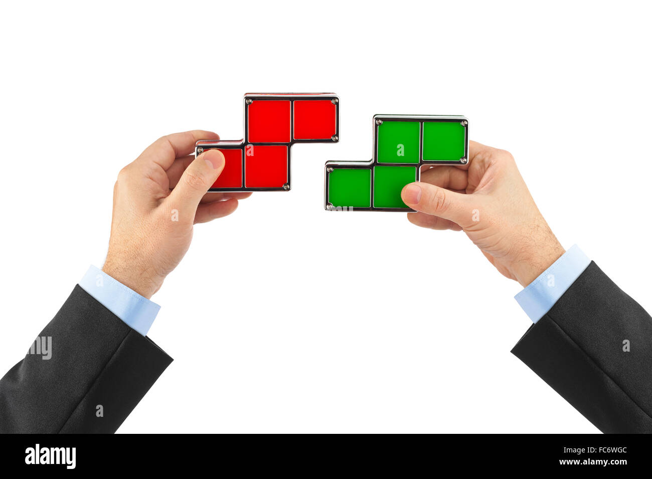 Hands with tetris toy blocks Stock Photo - Alamy