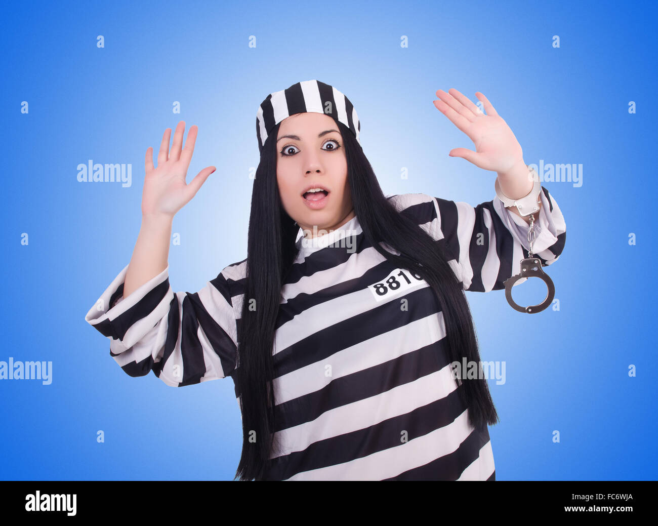 Prisoner in striped uniform on white Stock Photo - Alamy