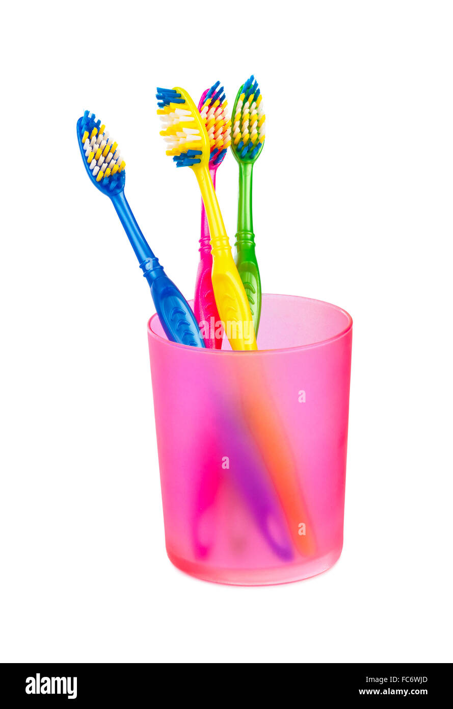 Toothbrushes in glass Stock Photo - Alamy