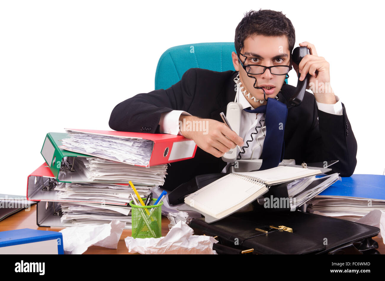 Busy businessman under work stress Stock Photo - Alamy