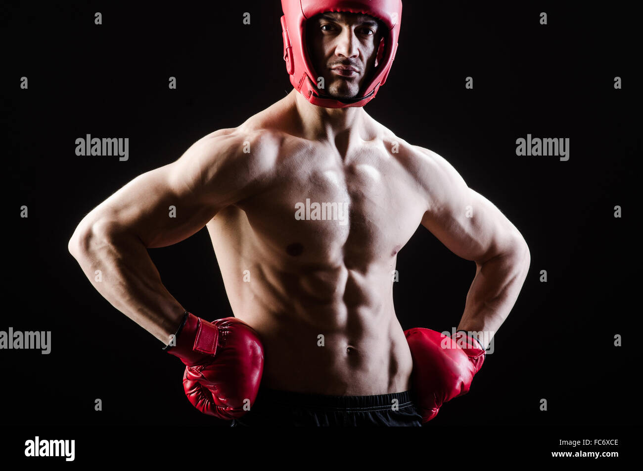 Muscular man in boxing concept Stock Photo - Alamy