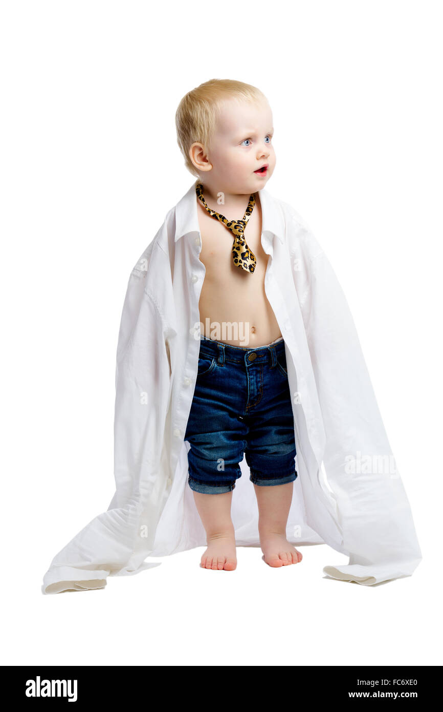 Little boy in a large shirt and tie Stock Photo - Alamy