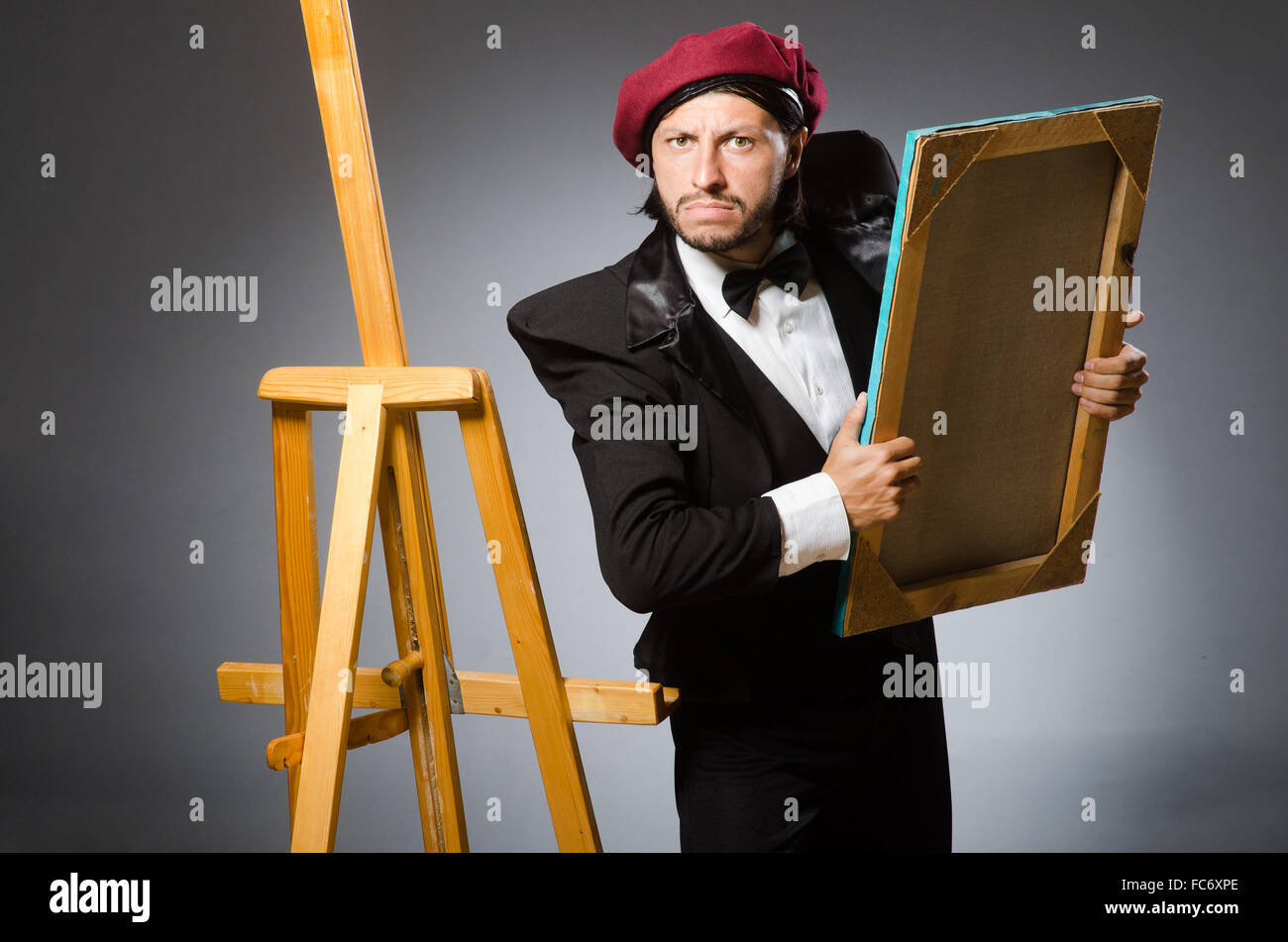 Funny artist working in the studio Stock Photo - Alamy