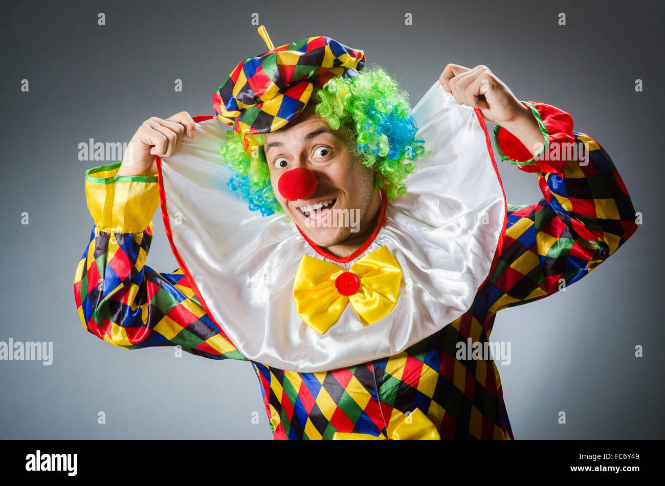 Funny clown in comical concept Stock Photo - Alamy