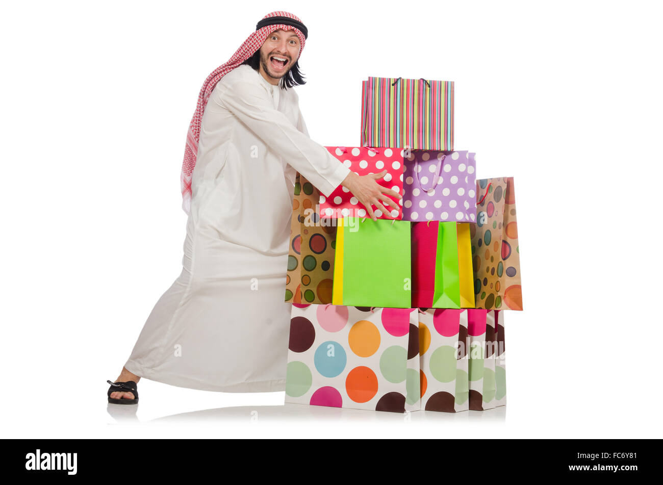 Arab man with shopping bags Stock Photo - Alamy