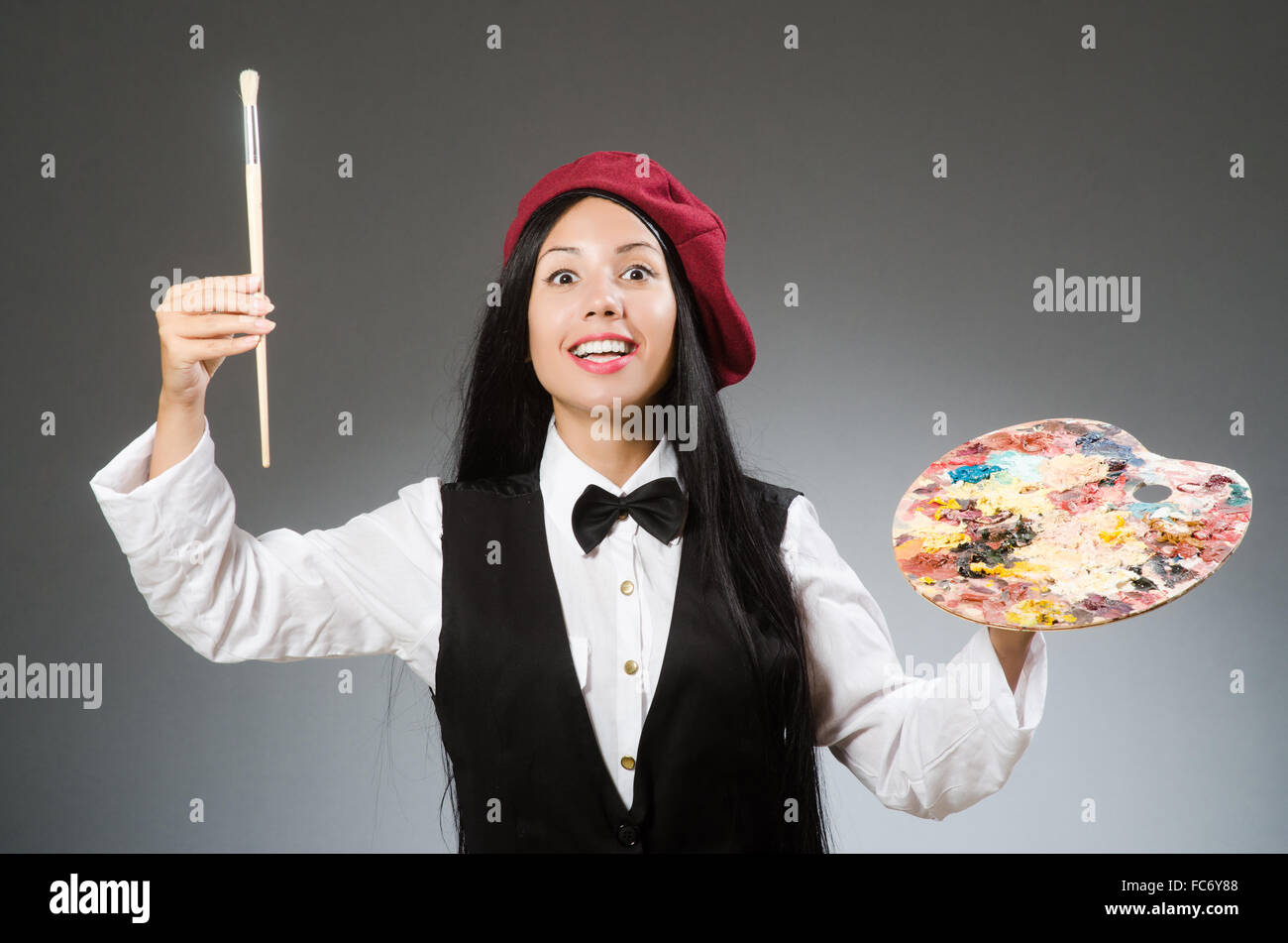 Funny artist working in the studio Stock Photo - Alamy