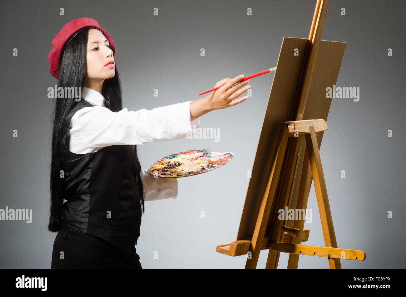 Funny artist working in the studio Stock Photo - Alamy