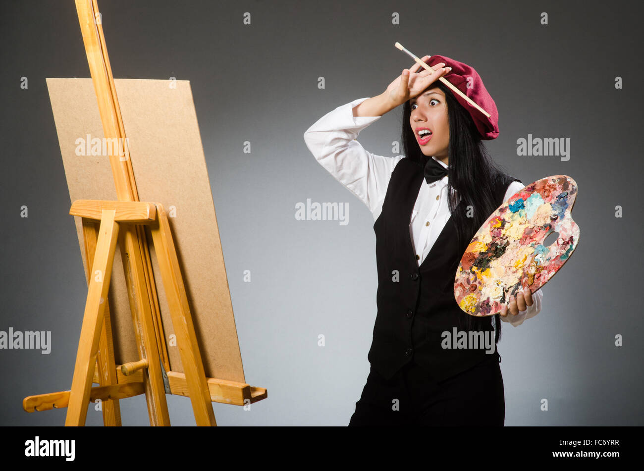 Funny artist working in the studio Stock Photo - Alamy