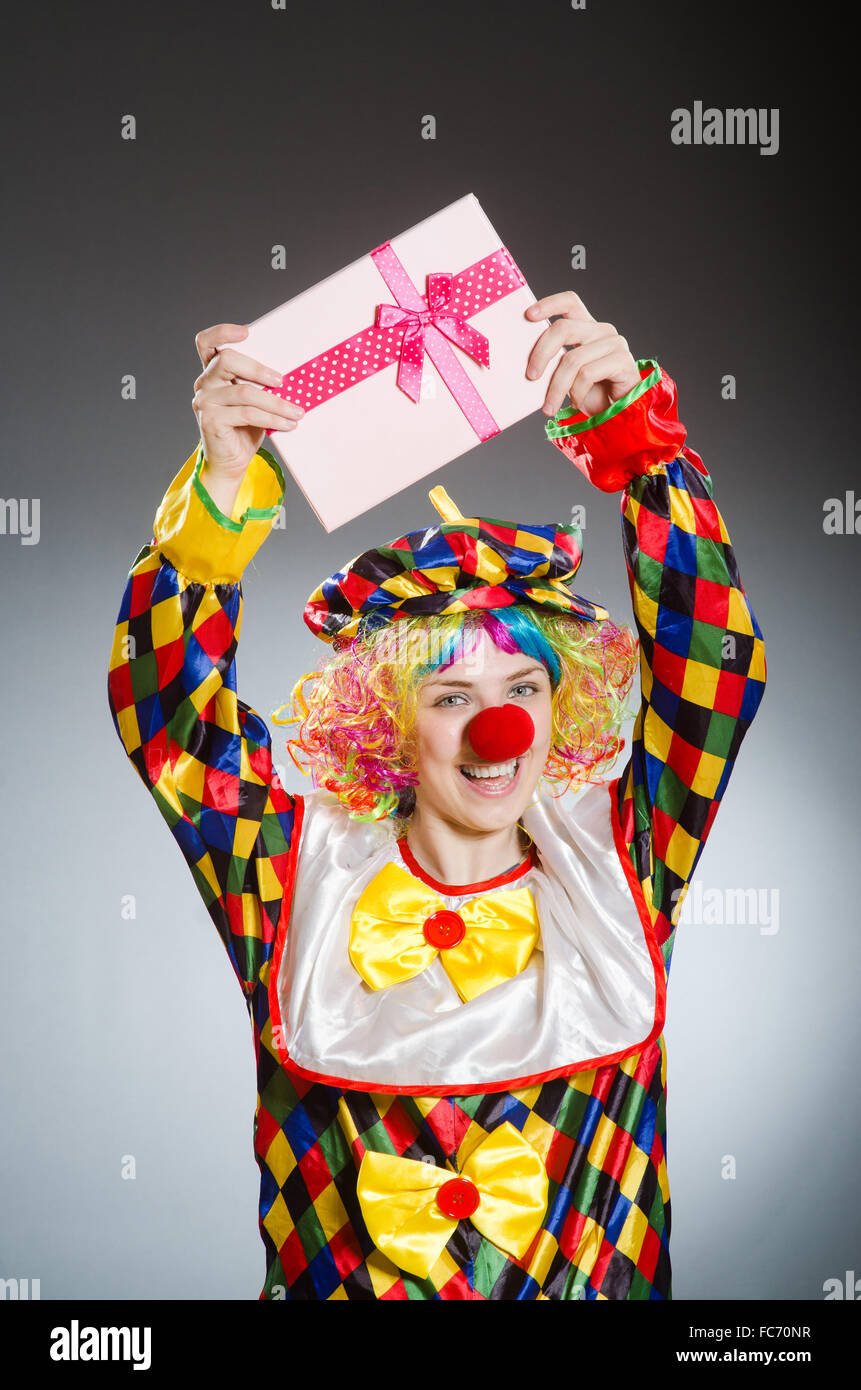 Funny clown in comical concept Stock Photo - Alamy