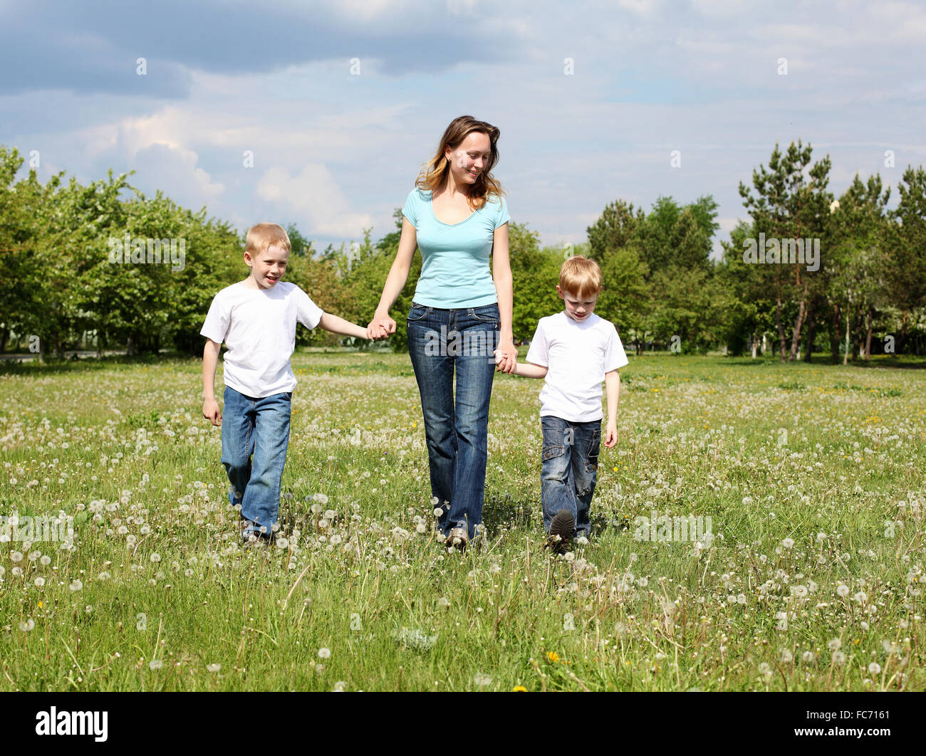 mother with her two sons outdoors together Stock Photo - Alamy