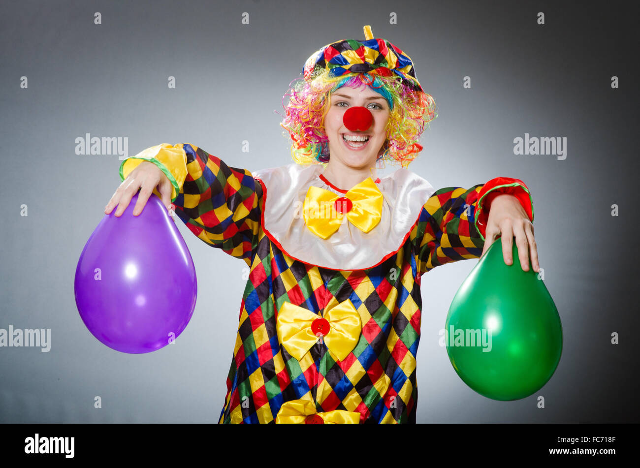 Funny clown in comical concept Stock Photo - Alamy