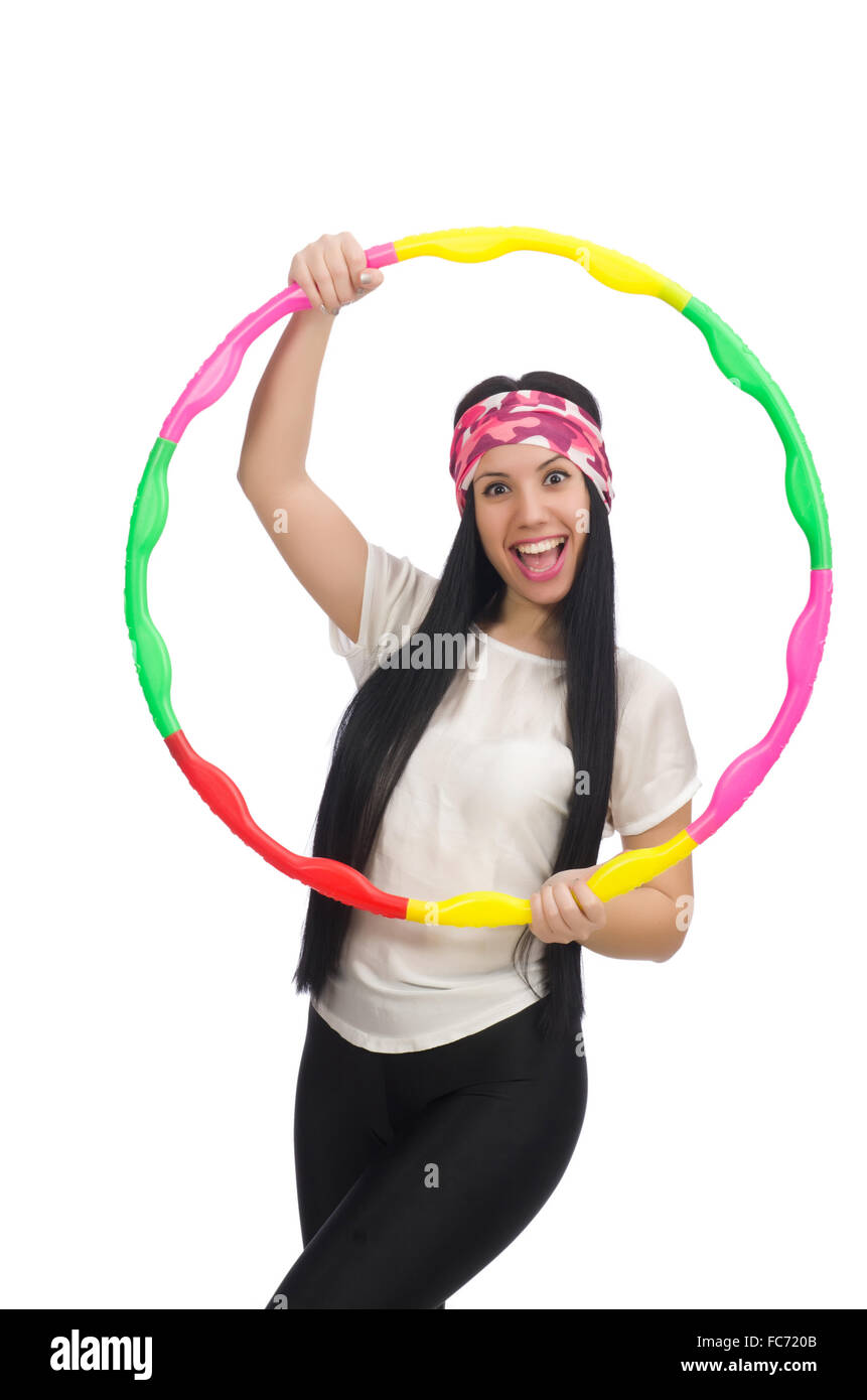 A girl in sport suit with hula hoop isolated on white Stock Photo - Alamy