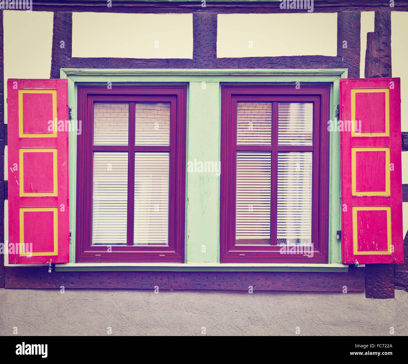 Medieval red painted window hi-res stock photography and images - Alamy