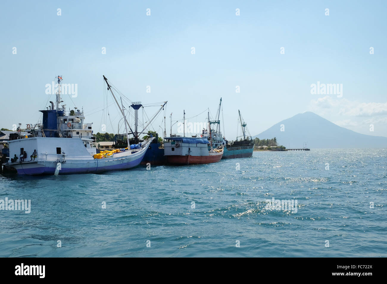 Lewoleba harbour with Mount Lewotolok in the background. Lembata Island ...