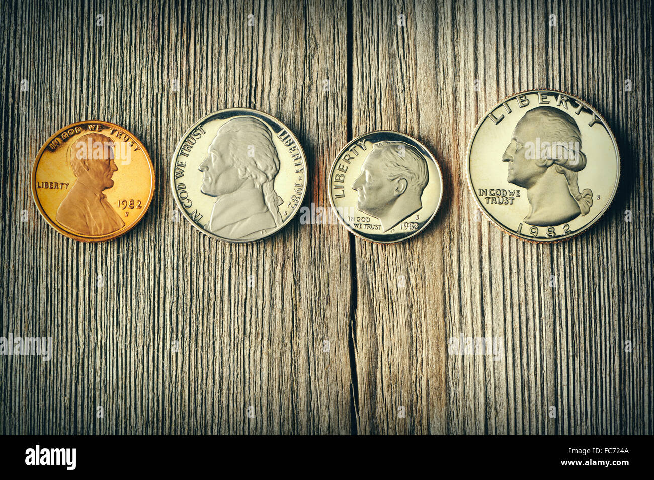 US cent coins over wooden background Stock Photo - Alamy