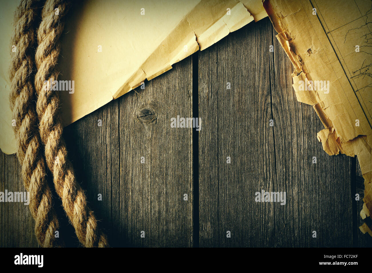 Old torn paper, map and rope Stock Photo - Alamy