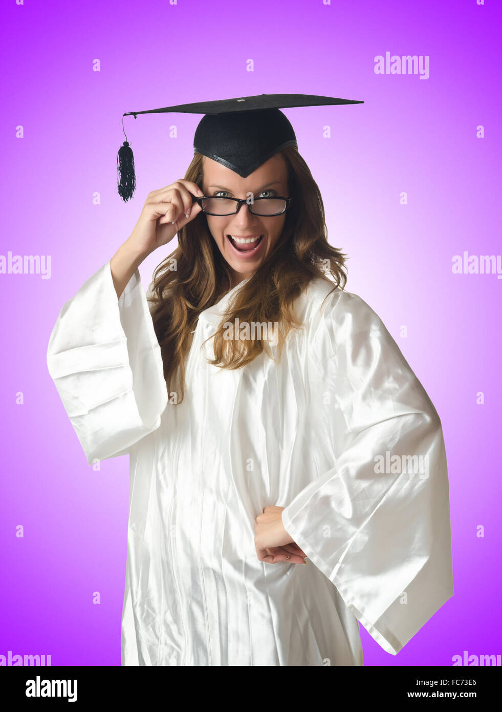 Young student with diploma on white Stock Photo - Alamy