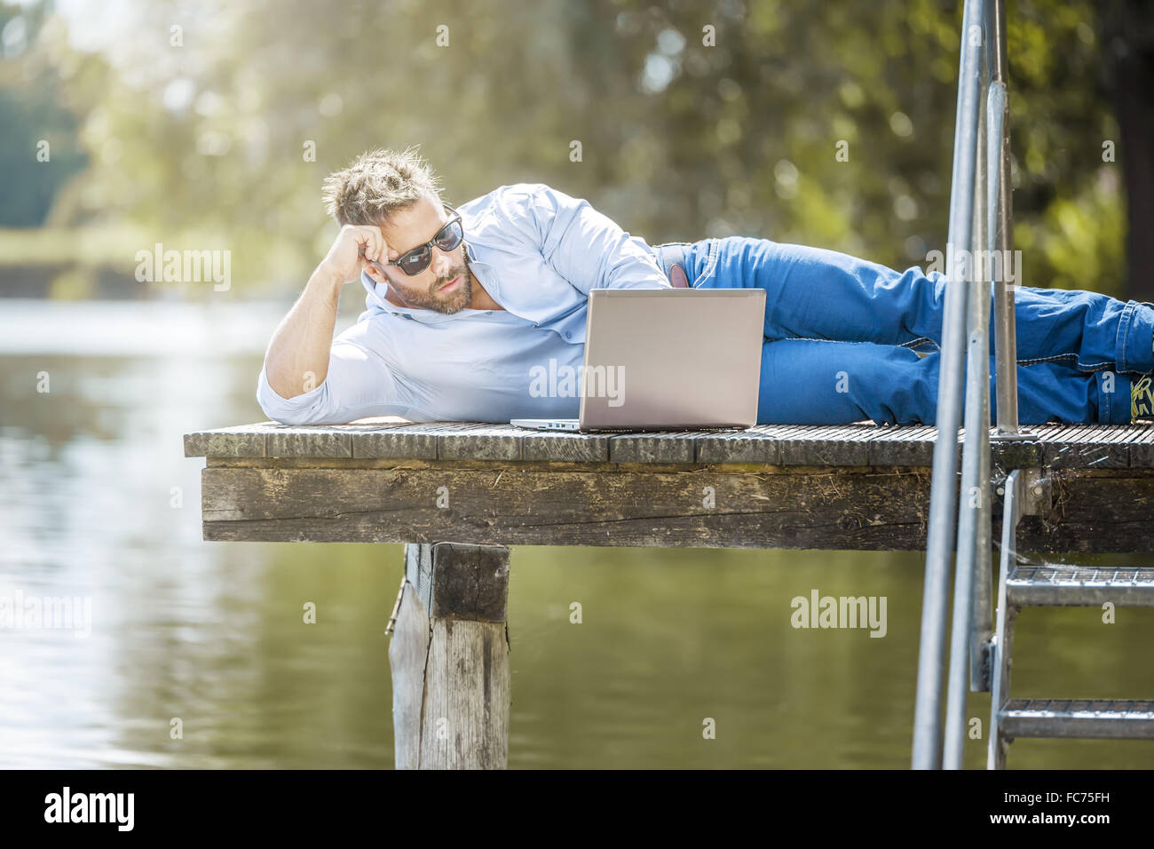 Handsome man outdoor using hi-res stock photography and images - Alamy