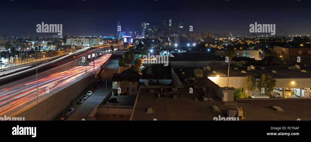 Aerial view of traffic on highway in Los Angeles cityscape, California ...