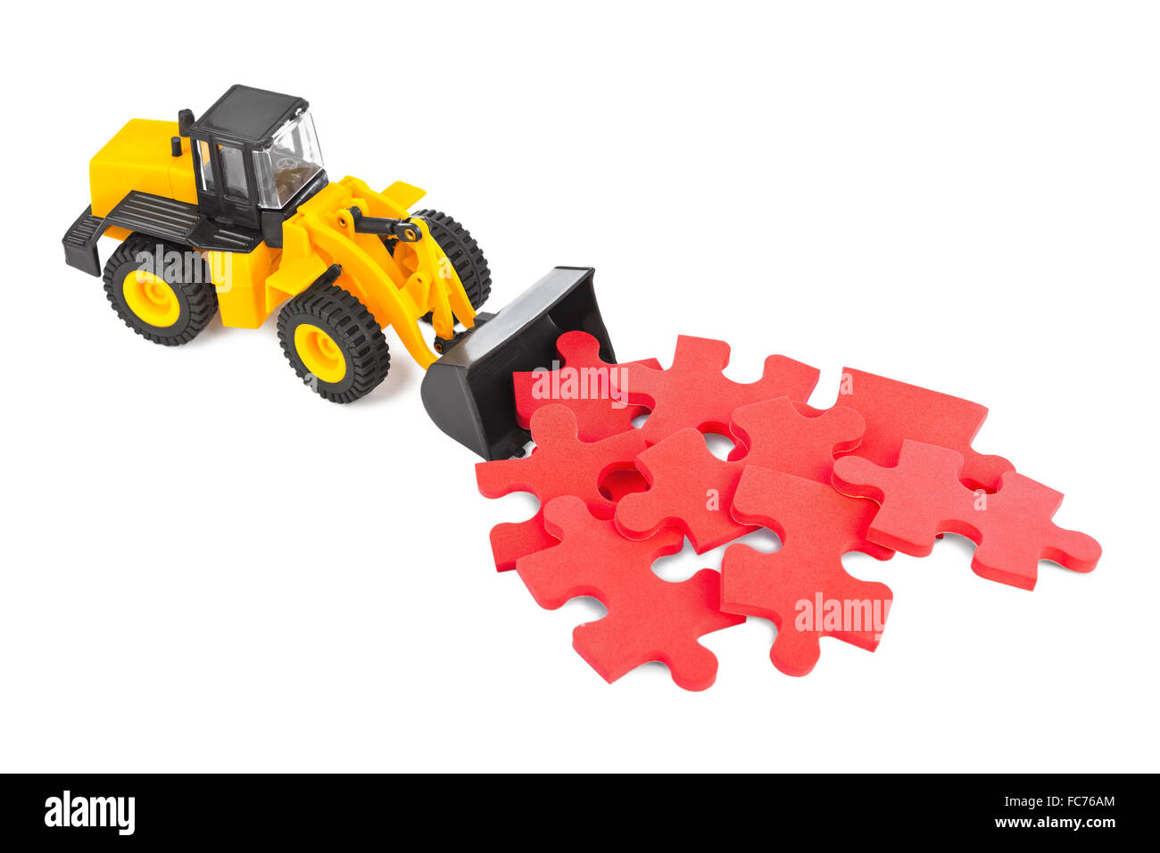 Toy loader with puzzle Stock Photo - Alamy